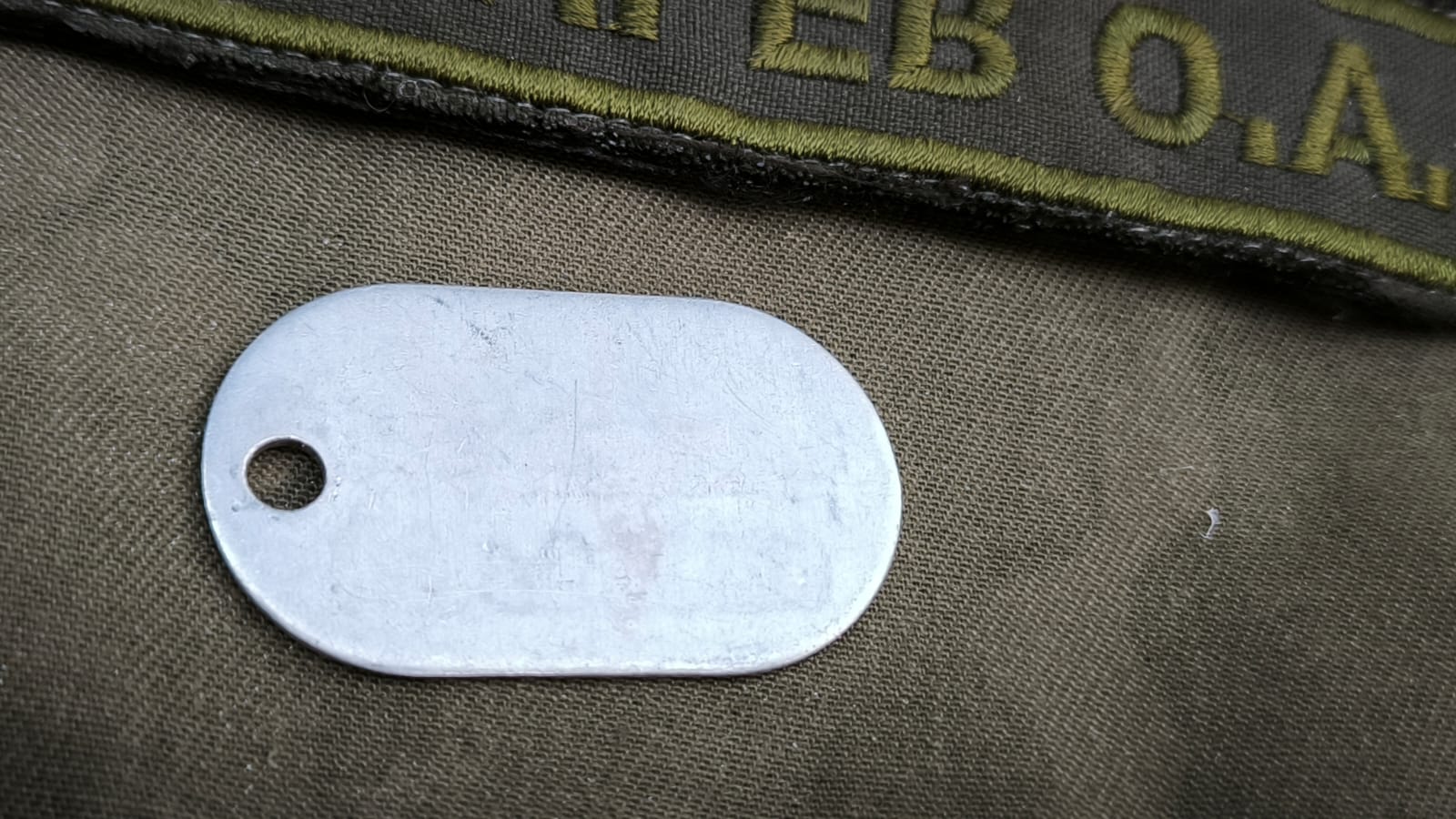 Trophy russian set of chevron patches and dog tag from the same owner ...
